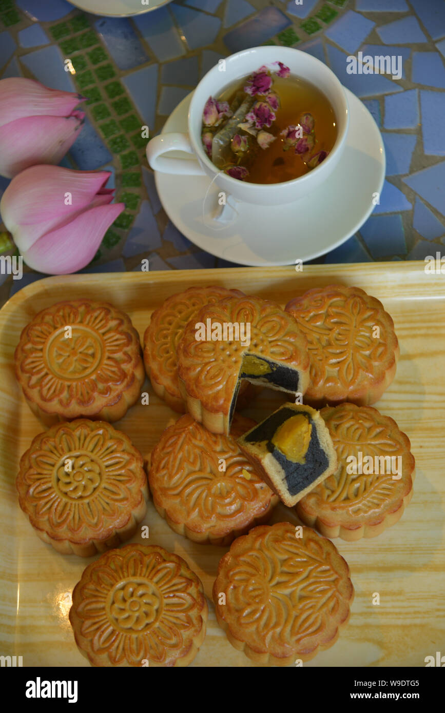 Tasty moon cake for Mid-Autumn festival with tea pot Stock Photo - Alamy