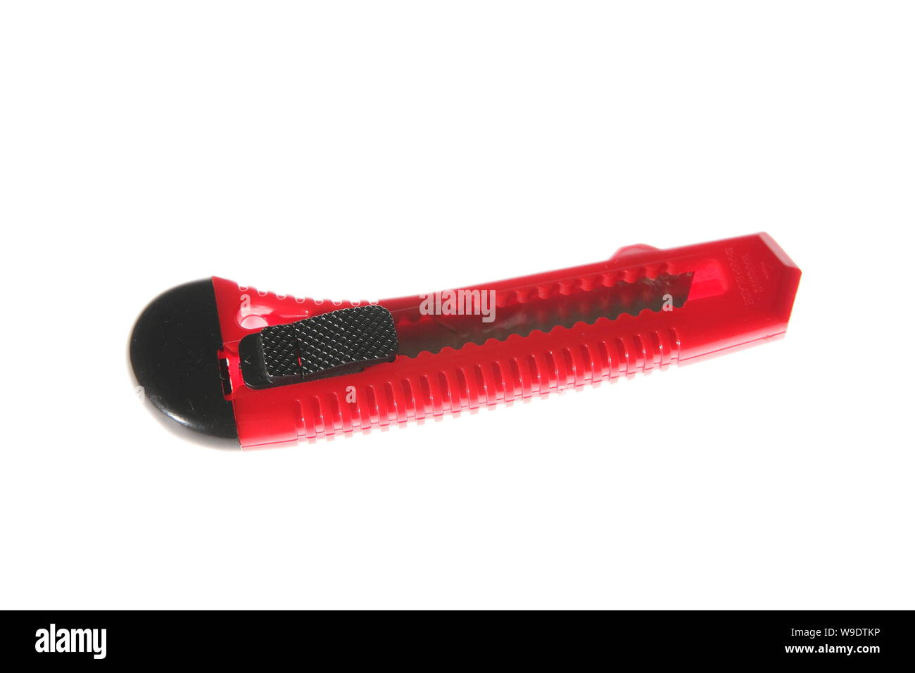 Red cutter knife isolated on white background. Handcraft concept Stock ...