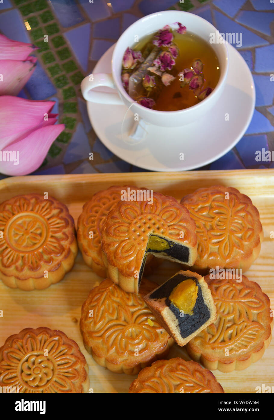 Tasty moon cake for Mid-Autumn festival with tea pot Stock Photo - Alamy