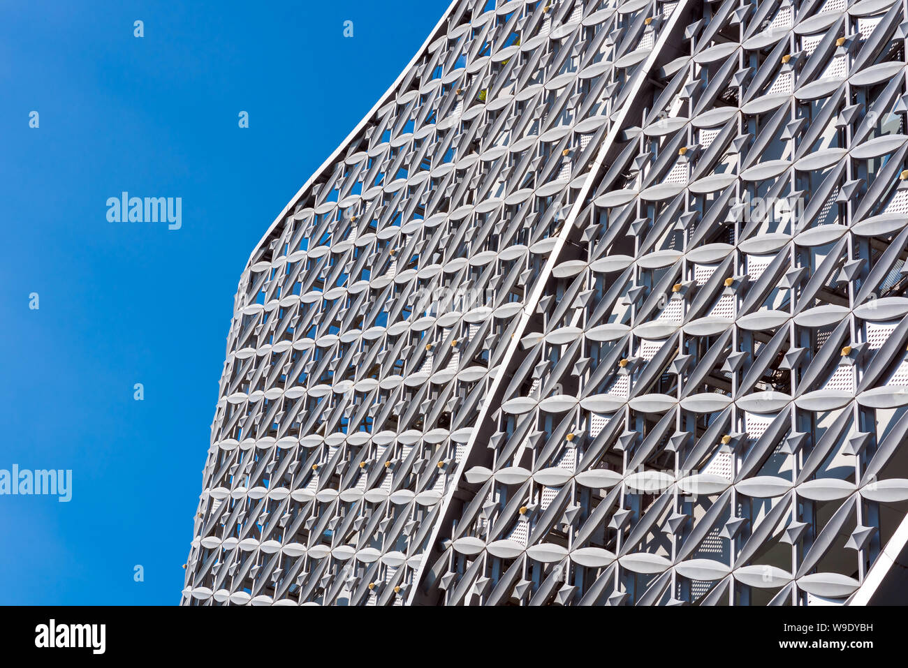 Abstract close up of modern exterior architectural metal wall pattern ...