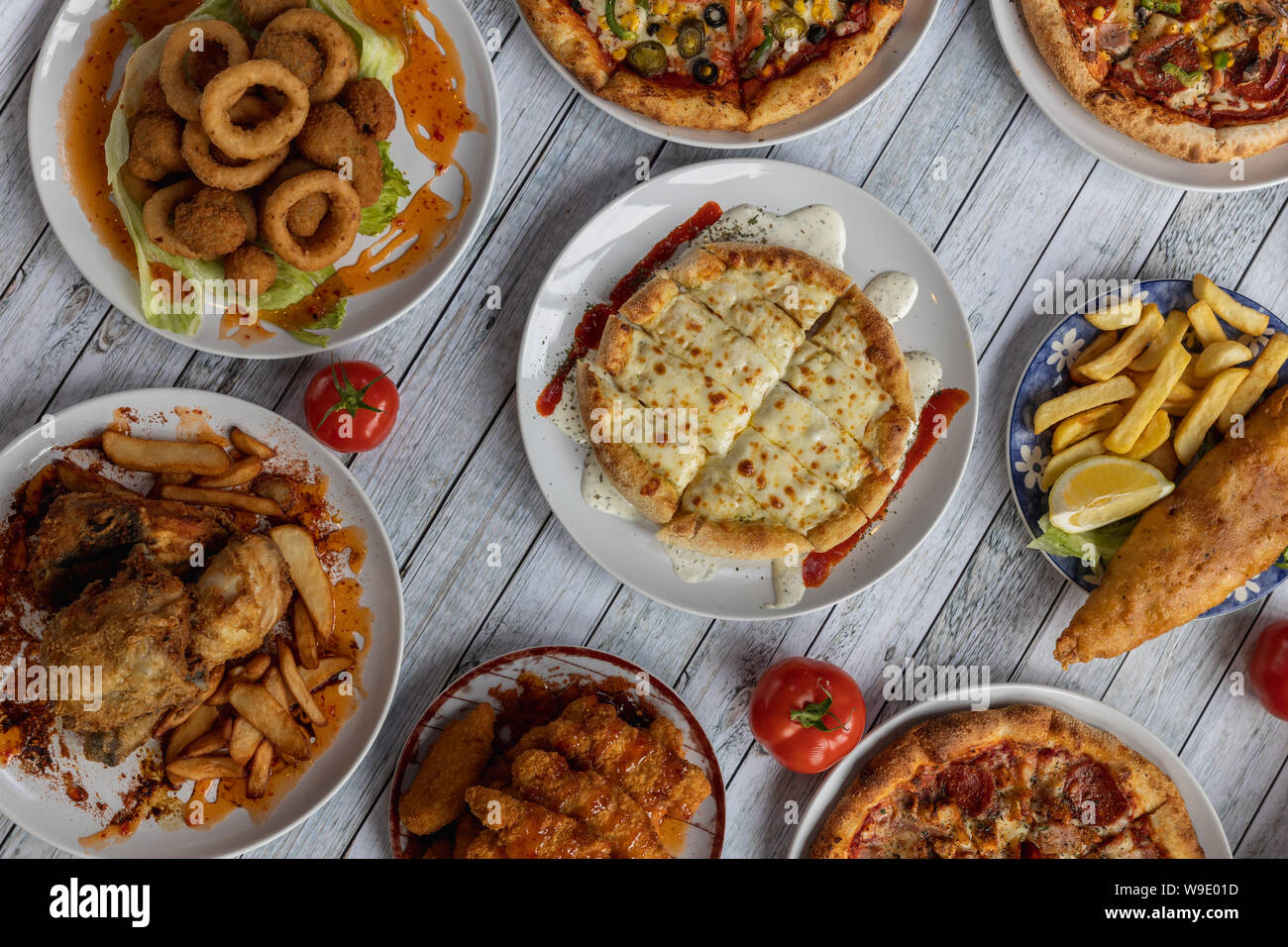 TAKE AWAY FOOD Pizza fish and Chips Stock Photo - Alamy