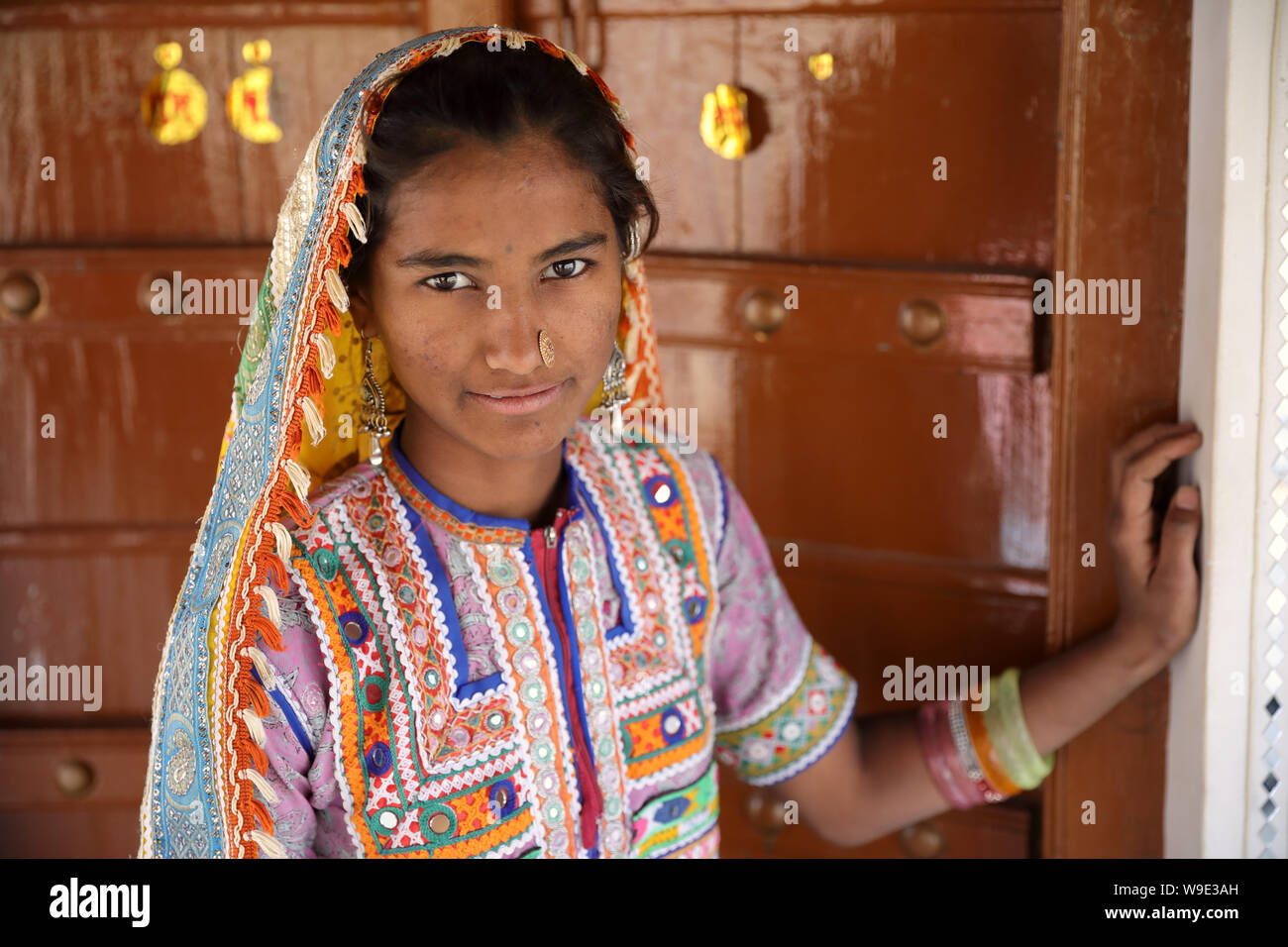 Young tribal woman in a rural village in the district of Kutch, Gujarat ...