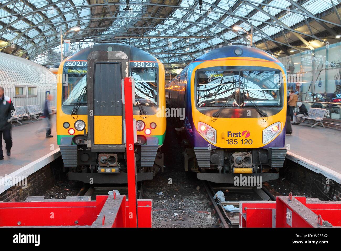 LIVERPOOL, UK - APRIL 20, 2013: Passengers board London Midland and ...