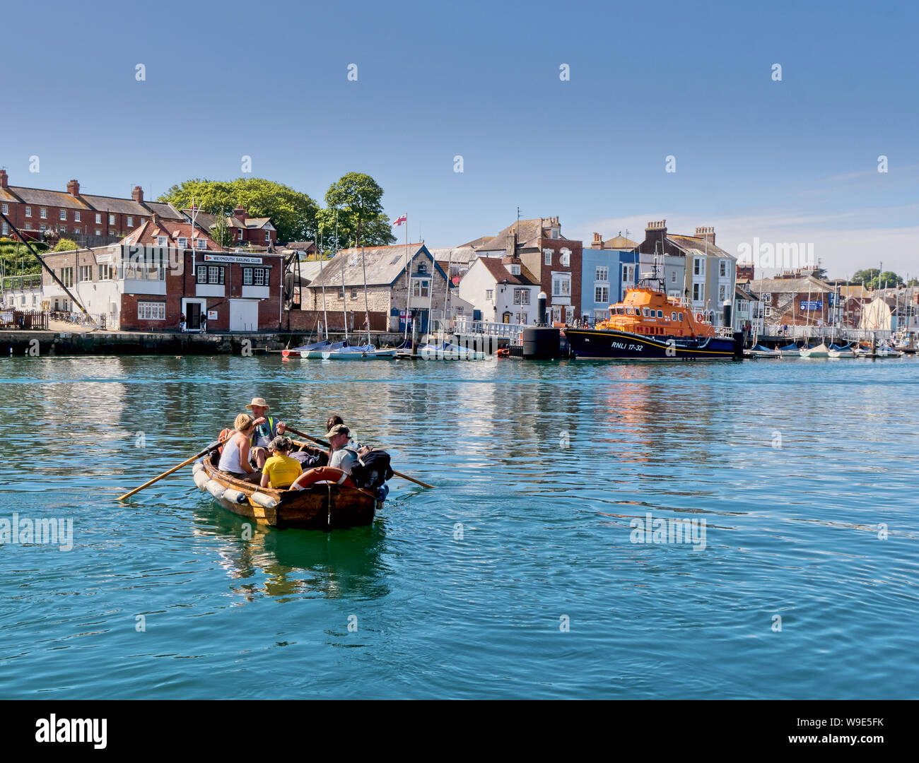 Weymouth Harbour row boat ferry crossing the lower harbour Stock Photo ...