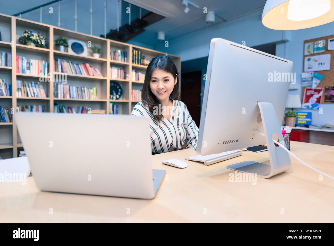 Young business entrepreneur working on the smart computer at co ...