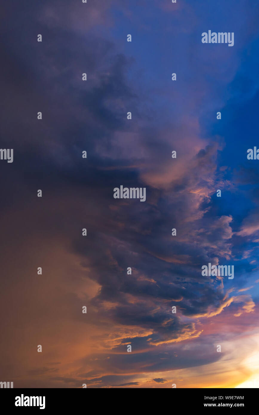 Dramatic sky with storm cloud before raining during sunset Stock Photo ...
