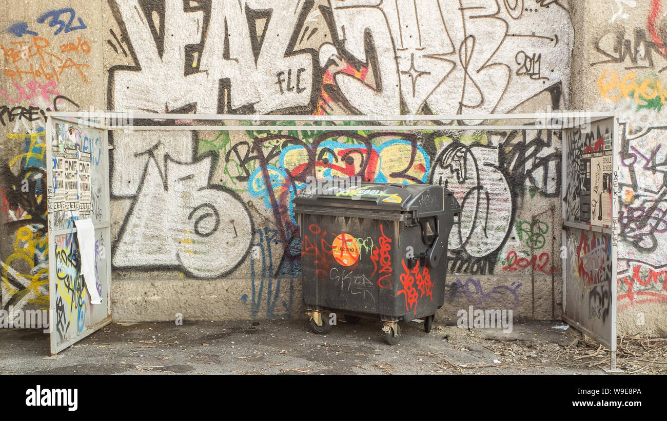 Dustbin in dirty environment. Pollution concept Stock Photo - Alamy