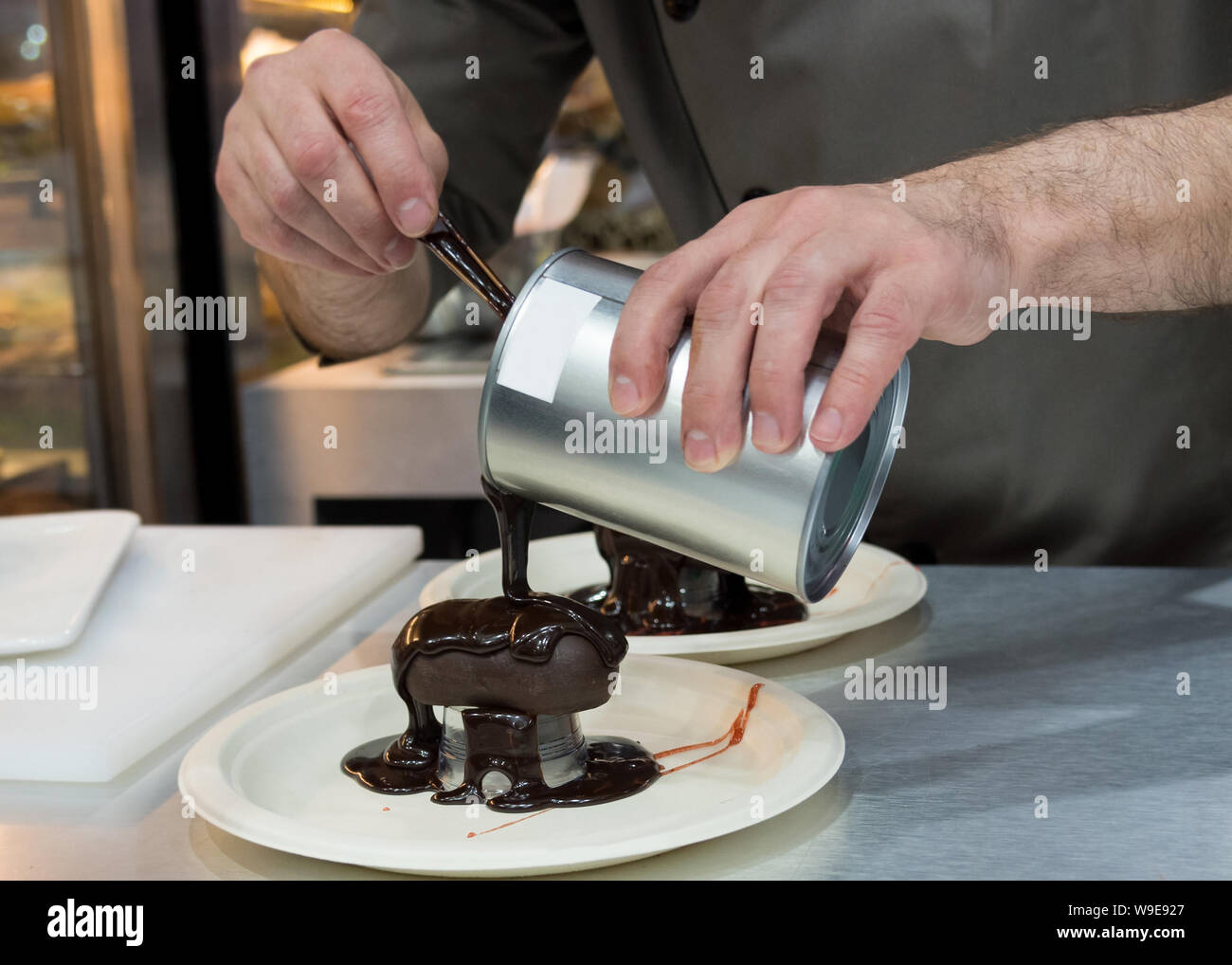 Pastry chef decorating, chef preparing desert chocolate cake Stock ...
