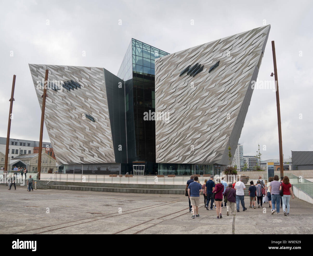 Tourists on a guided tour of the Titanic experience and museum in ...