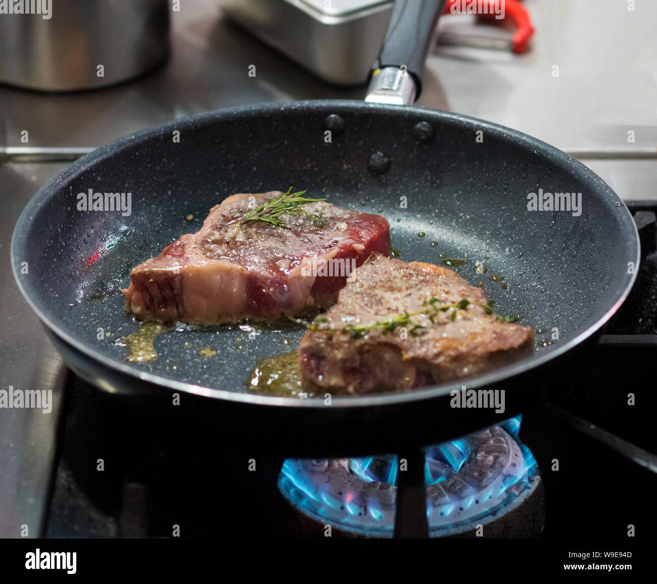 Chef grilled steak in pan hi-res stock photography and images - Alamy