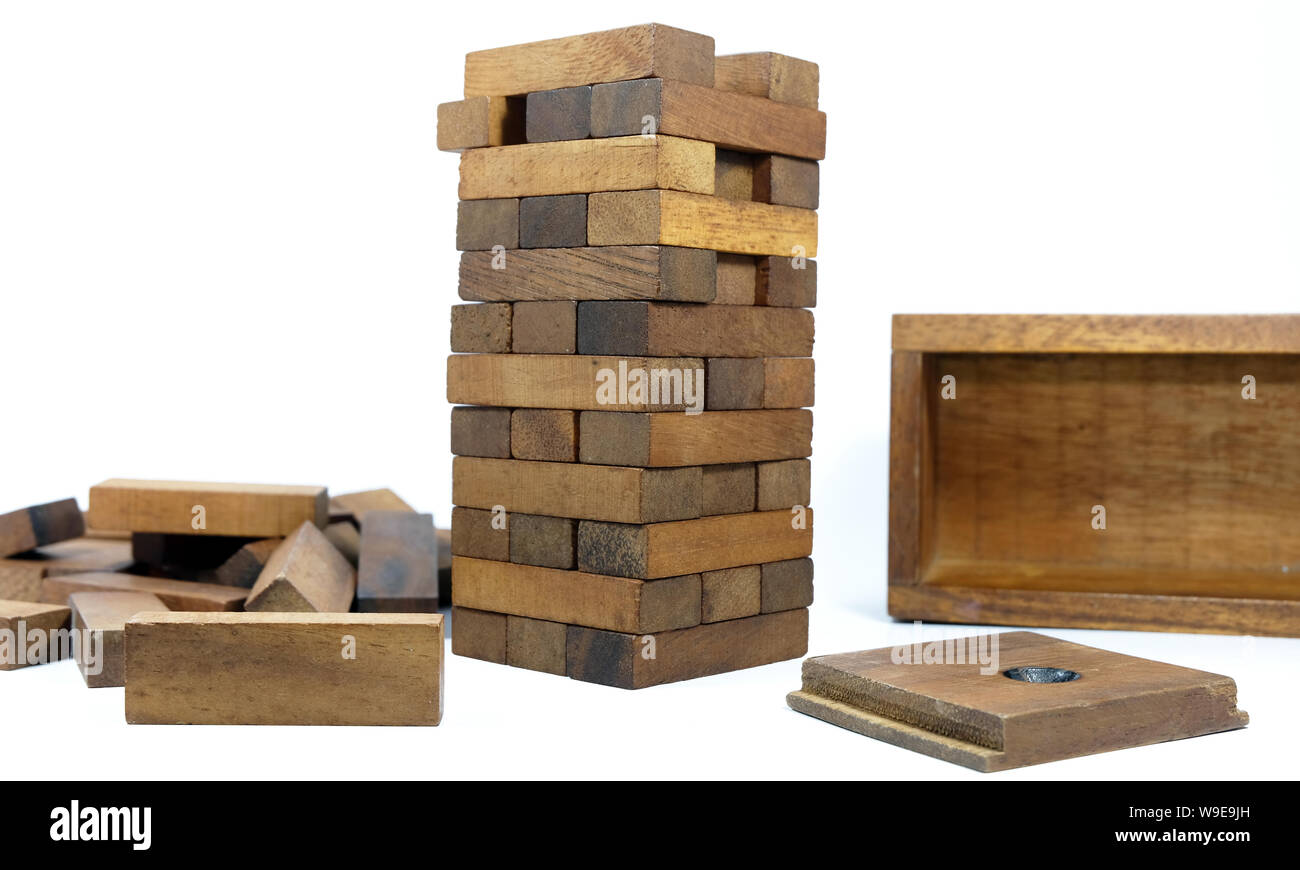 Blocks wood Jenga game on white background Stock Photo - Alamy