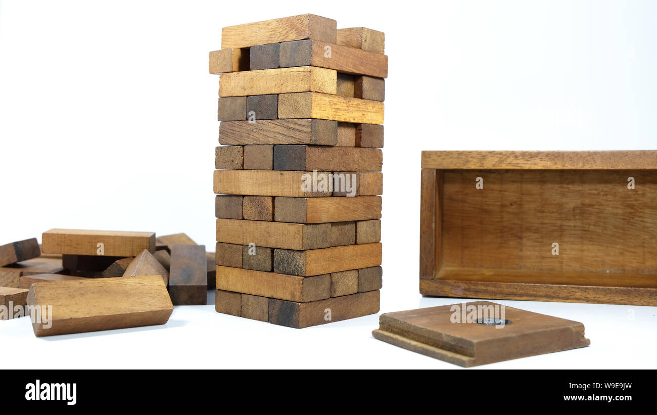 Blocks wood Jenga game on white background Stock Photo - Alamy