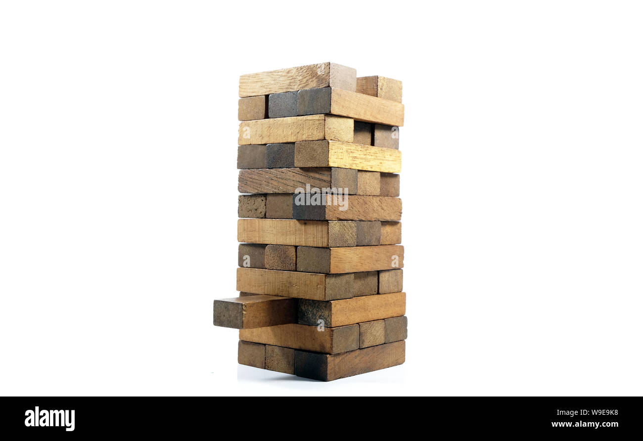 Construction of the tower Jenga games on a white background Stock Photo ...