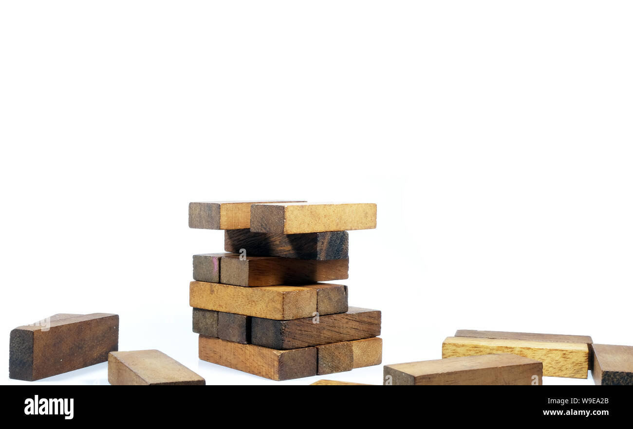 Construction of the tower Jenga games on a white background Stock Photo ...