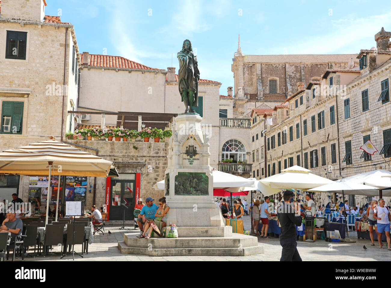DUBROVNIK, CROATIA - JULY 11,2019: Main Gundulic Square with sculpture ...