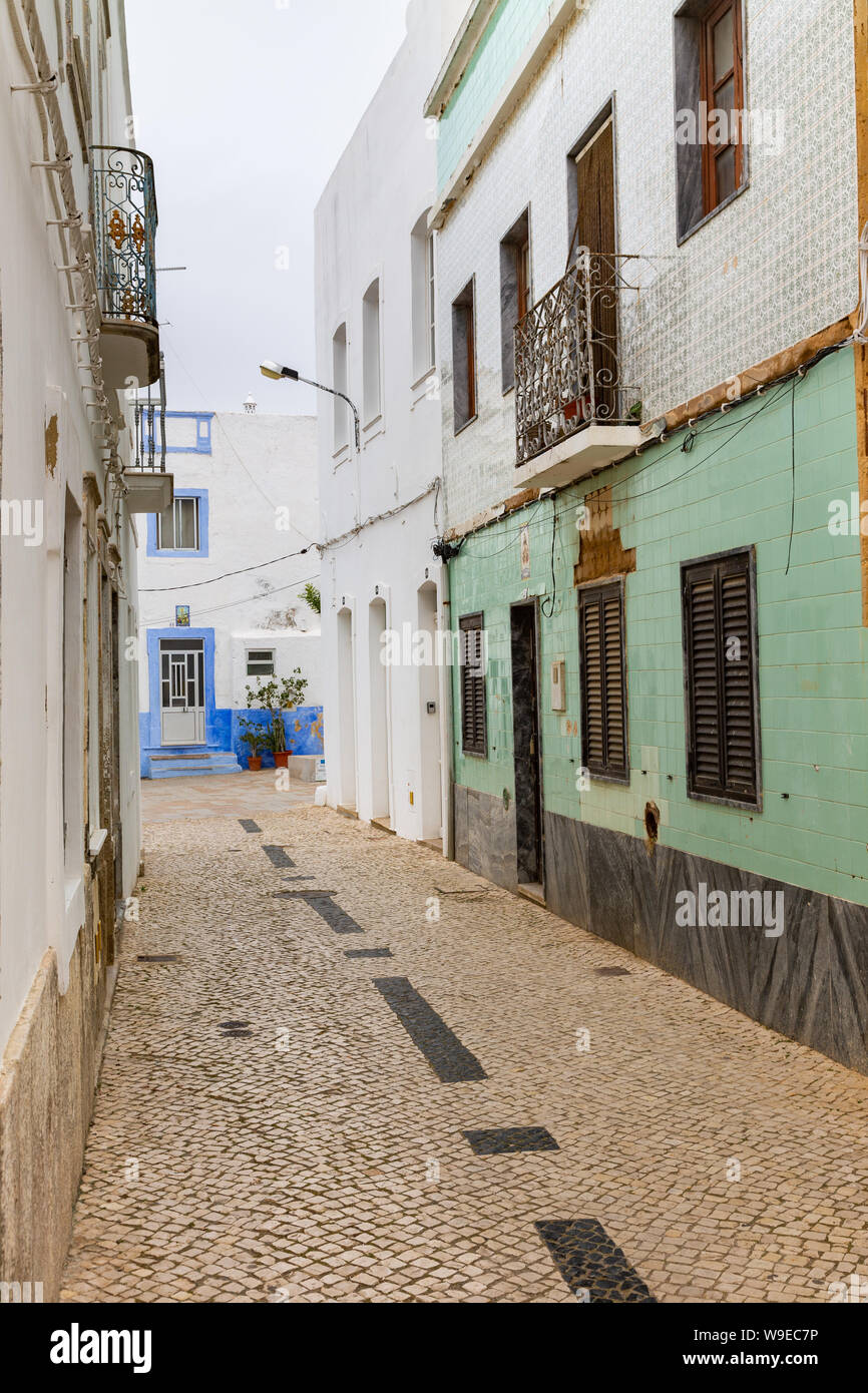 Narrow alley in the old town in Olhao, Algarve, Portugal Stock Photo ...