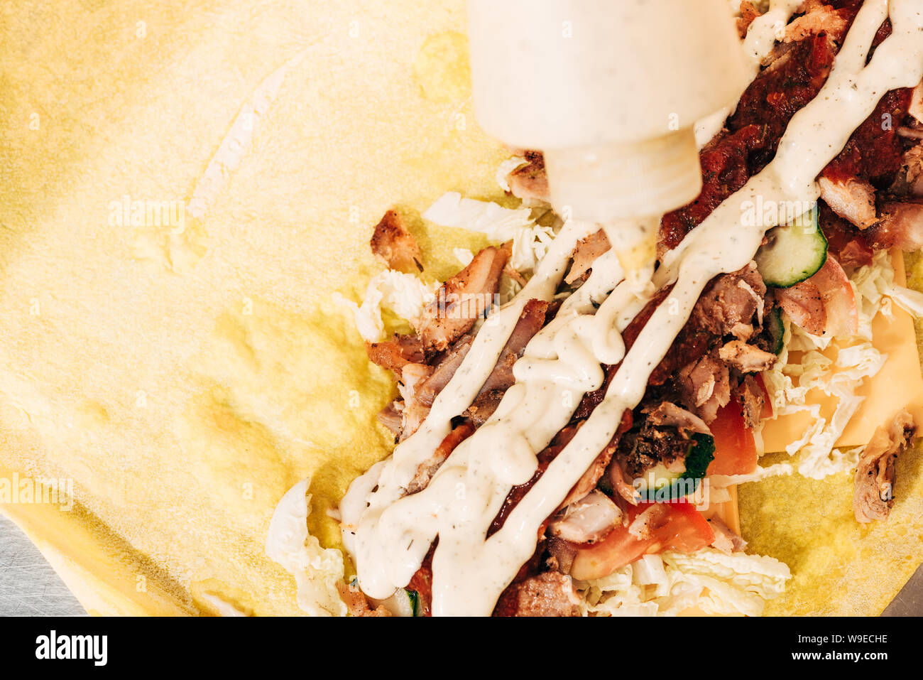 top view of doner kebab and bottle with sauce Stock Photo - Alamy