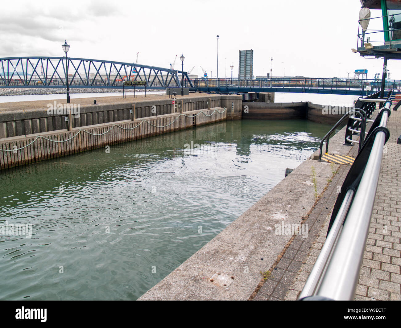 Tawe Barrage Lock in Swansea. The lock is full of water and the Tawe ...