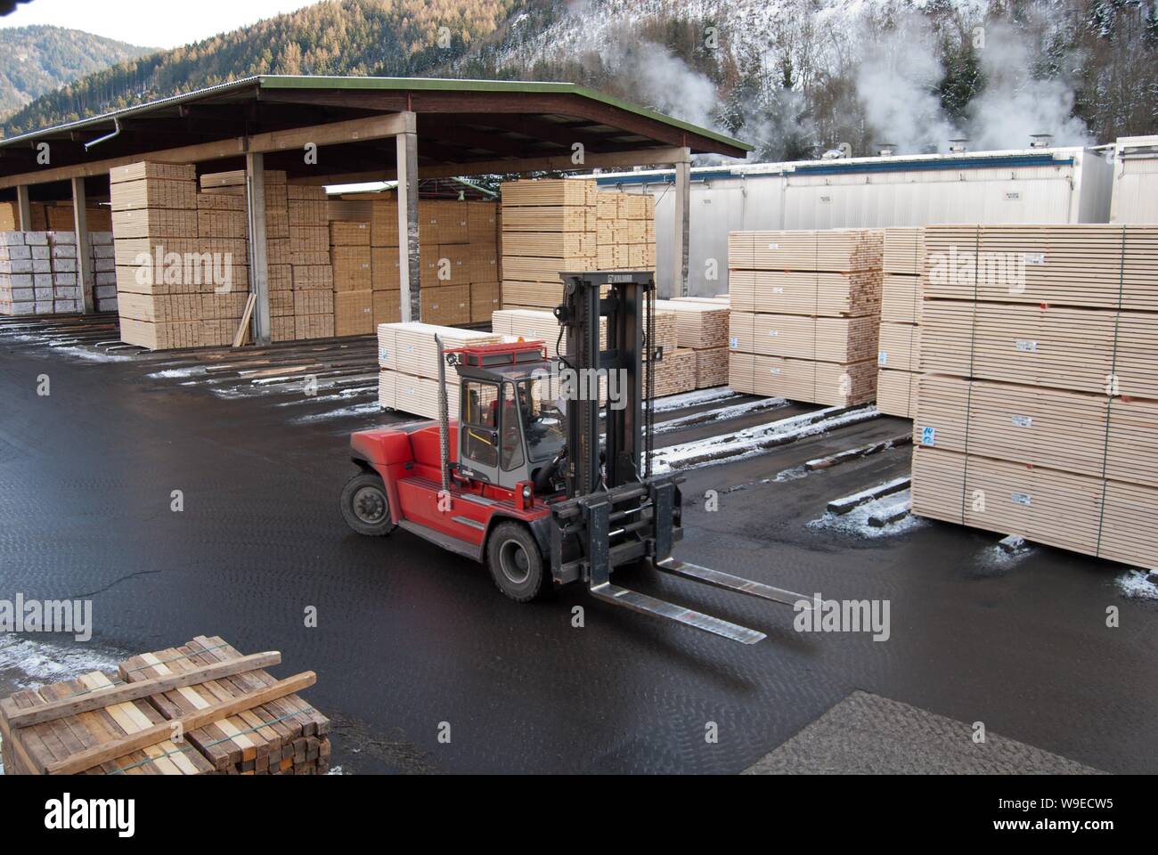 Forklift at the timber yard of a large sawmill, where the sawn wood ...