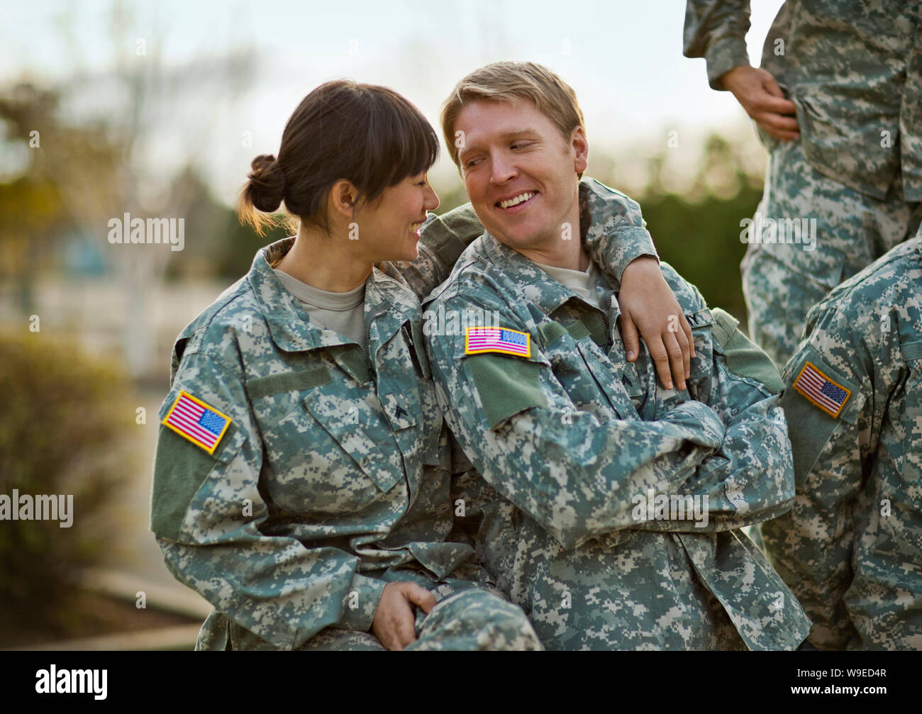 US Army soldiers relax together after a training exercise Stock Photo ...