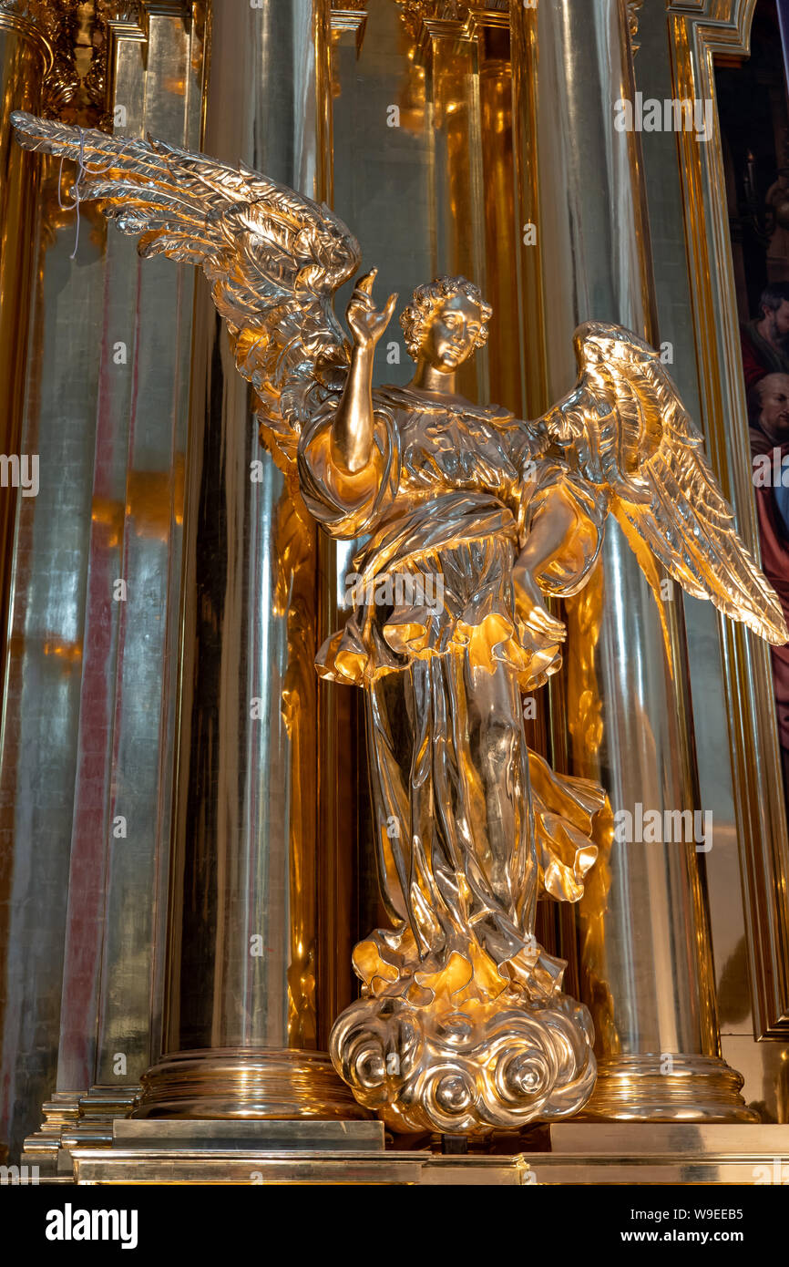 Gilded blessing Angel sculpture in Holy Cross Church in Warsaw, Poland ...