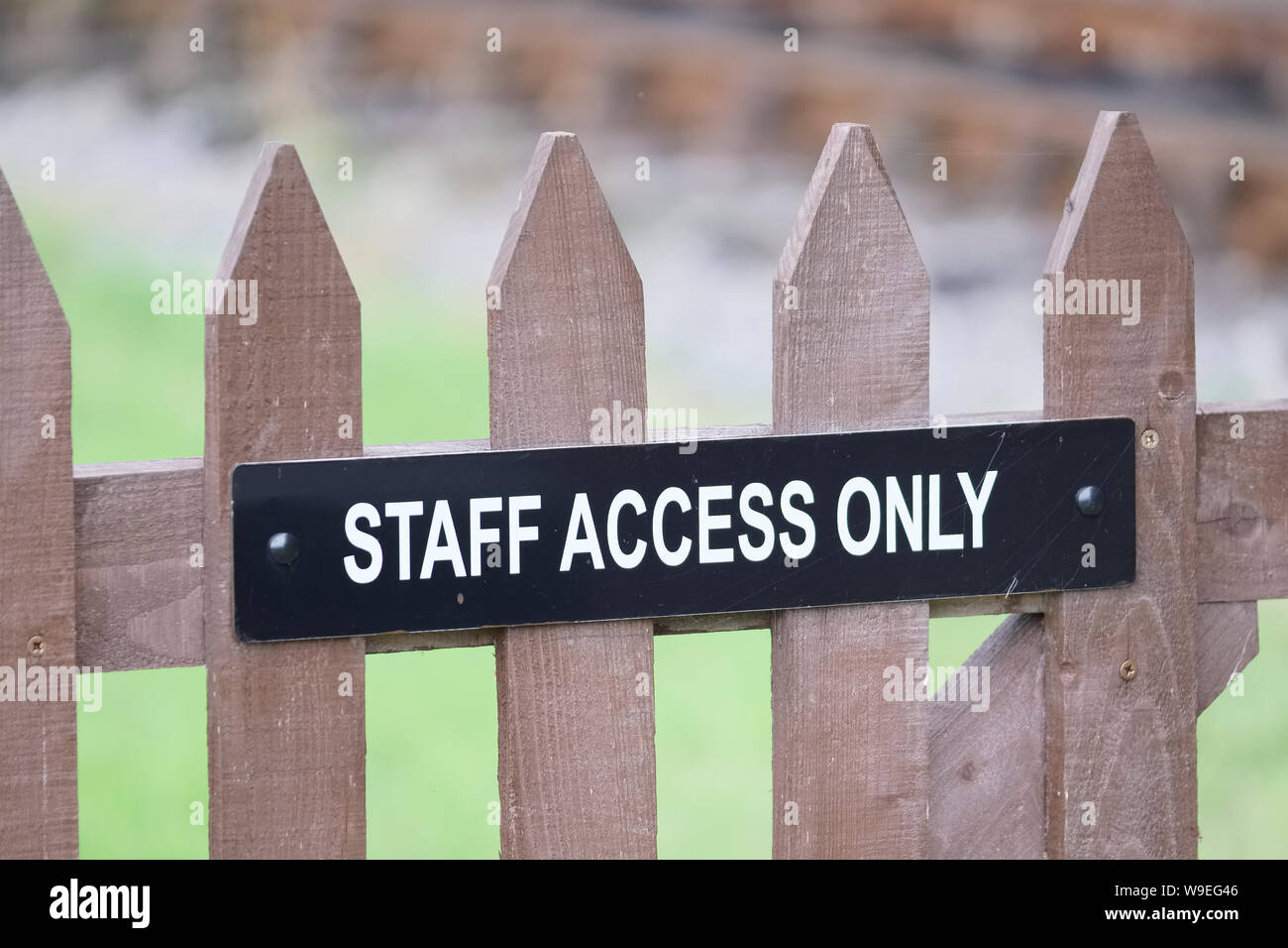 Staff access only sign on wooden gate at private railway Stock Photo ...
