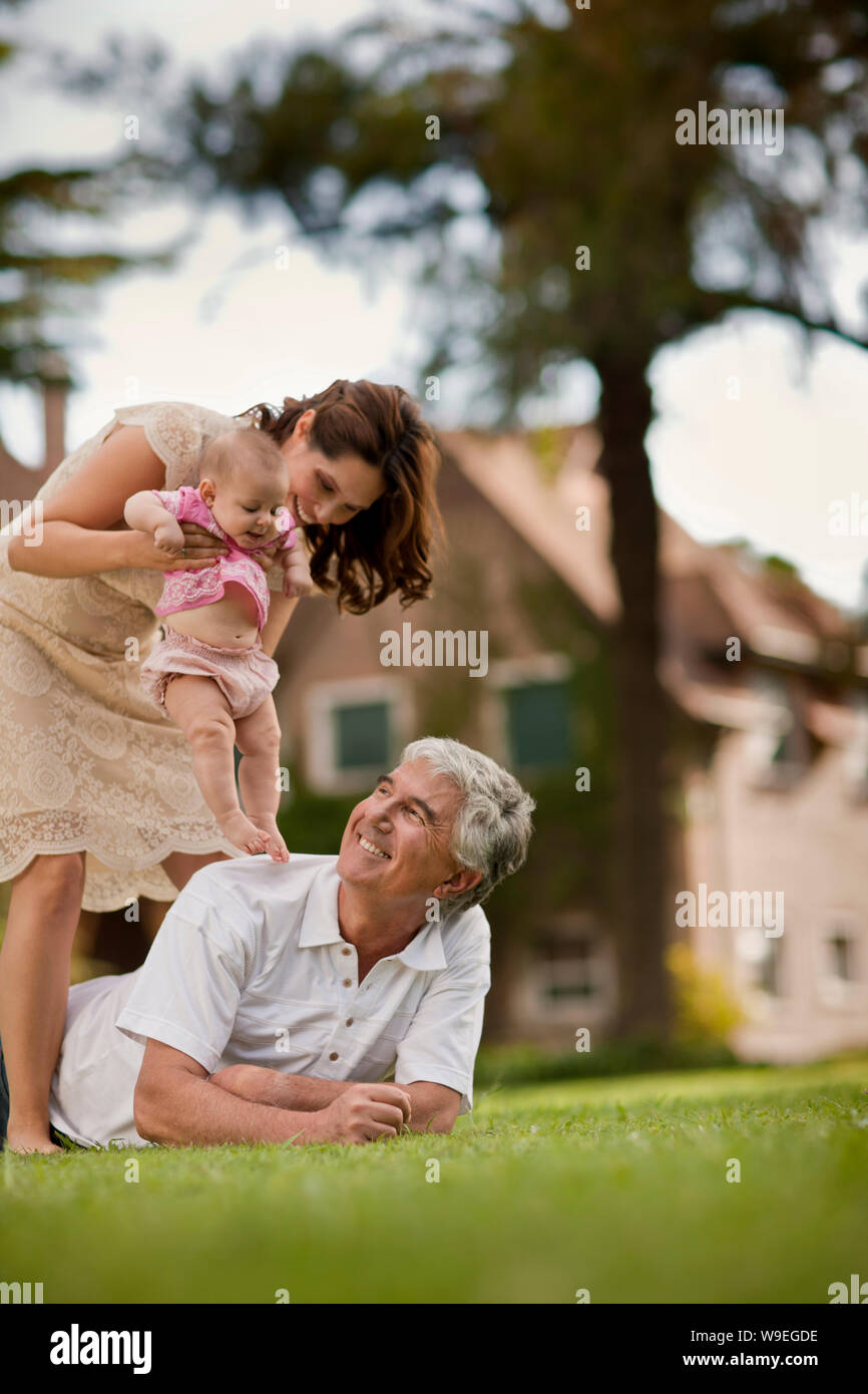 Mother leans over baby hi-res stock photography and images - Alamy