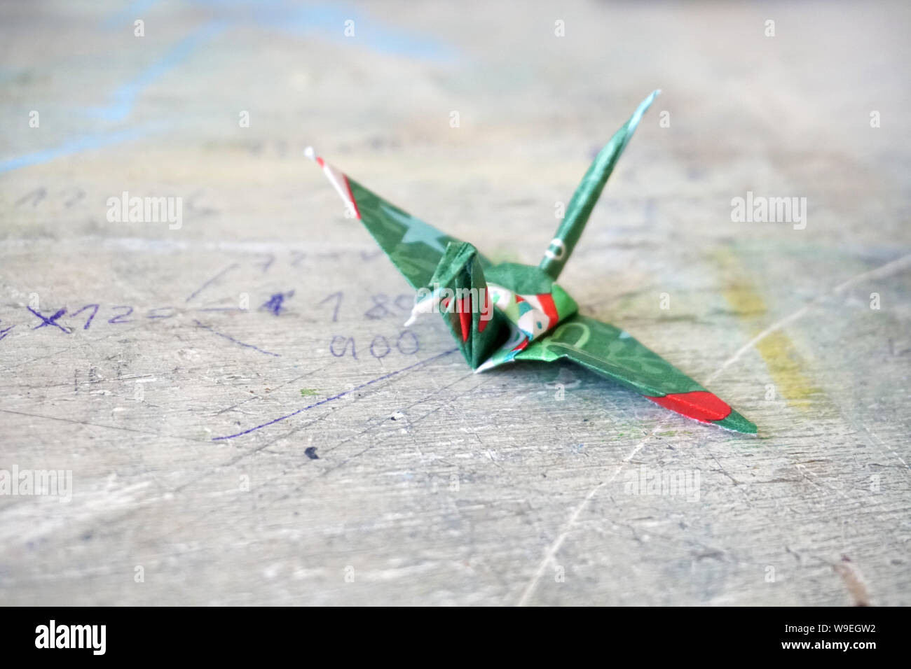 Girl with origami crane hi-res stock photography and images - Alamy