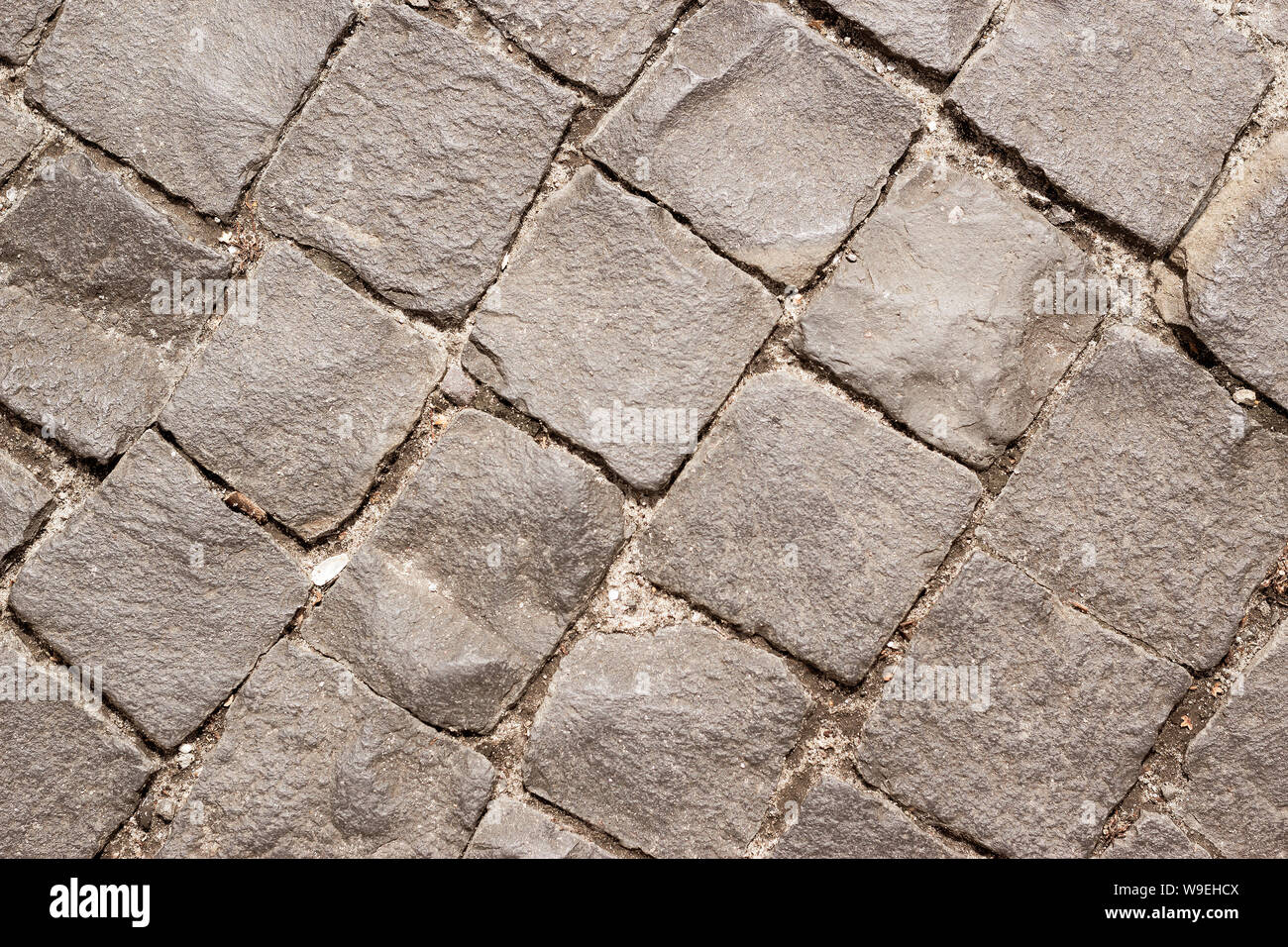 Ancient street pavement made of levelled stones into the ground Stock ...