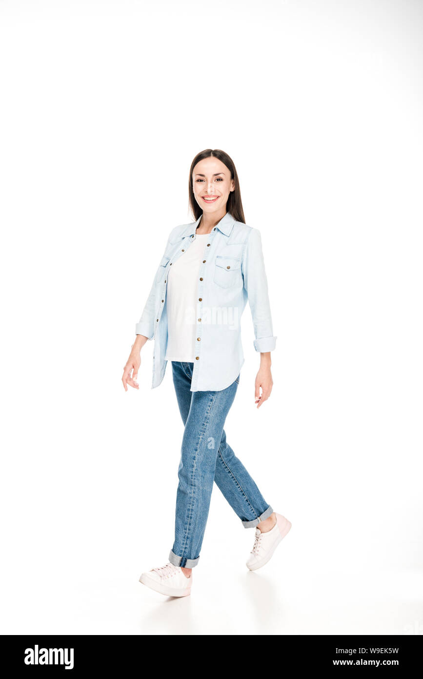 full length view of woman walking isolated on white Stock Photo - Alamy