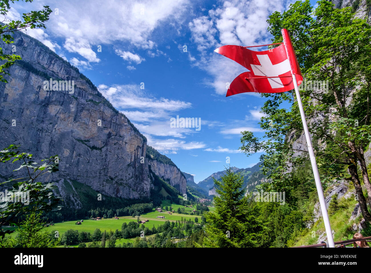 Switzerland flag in Alps, near Trümmelbach waterfalls Stock Photo - Alamy