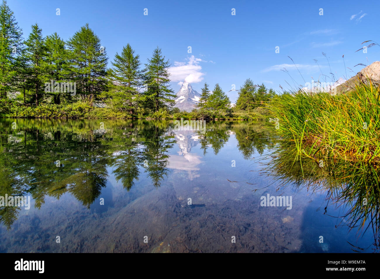 Reflection of Matterhorn in lake. Zermatt, Valais, Switzerland Stock ...