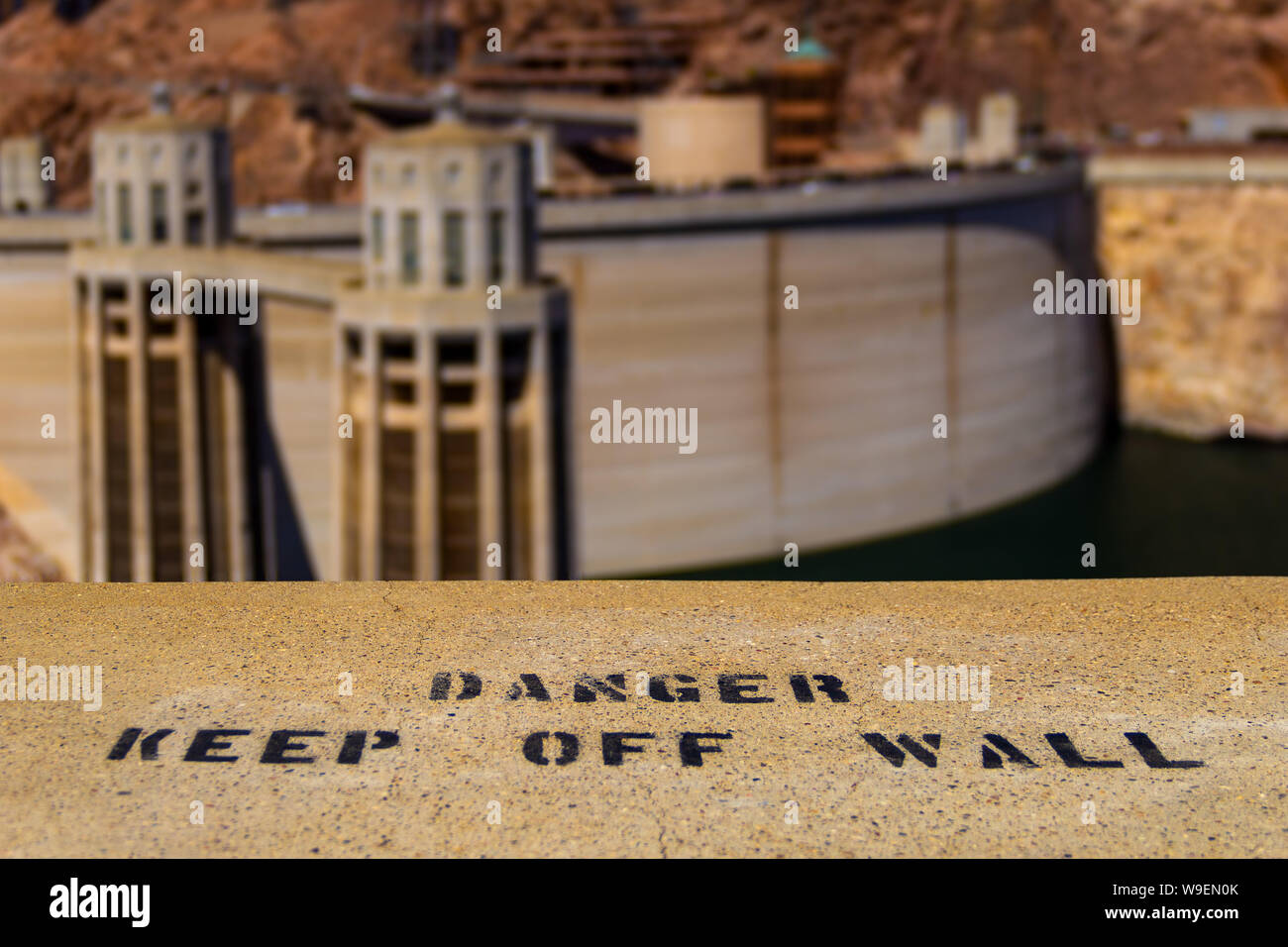 Danger keep off wall warning - Hoover Dam Stock Photo - Alamy