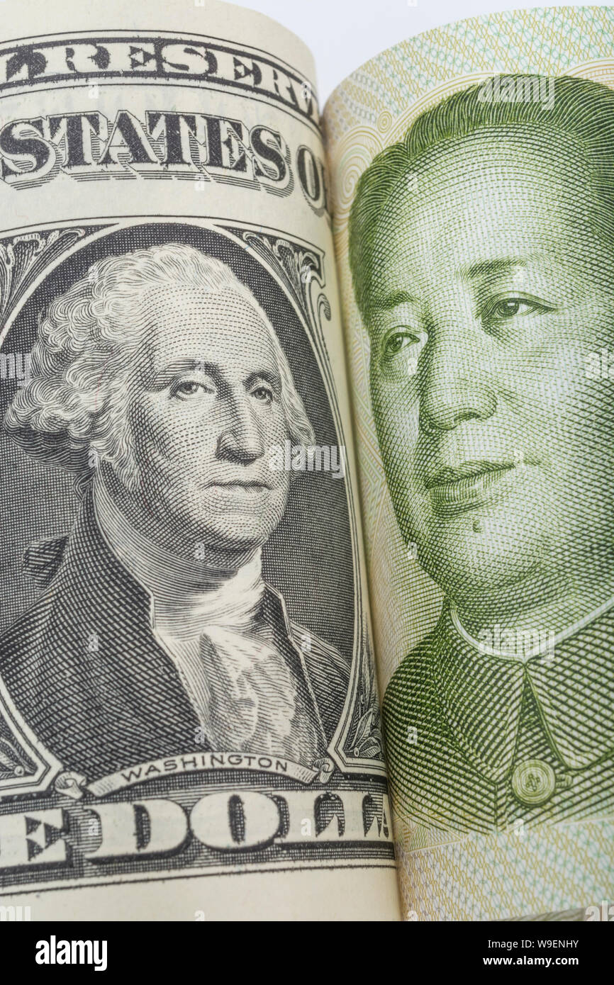 Macro close-up shot U.S. 1 Dollar bill banknote with Chinese Yuan 1 ...