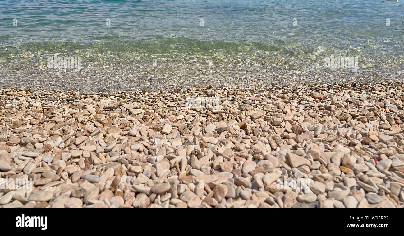 Pebbles stone beach in Croatia Stock Photo - Alamy