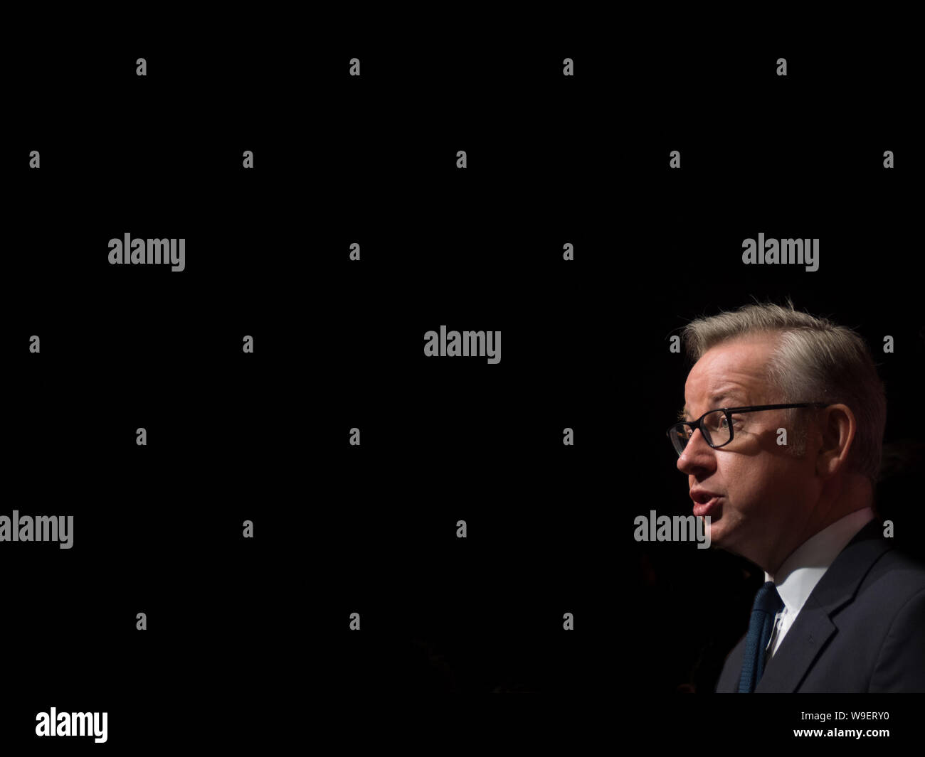 Conservative Cabinet member Micheal Gove portrait on simple black ...