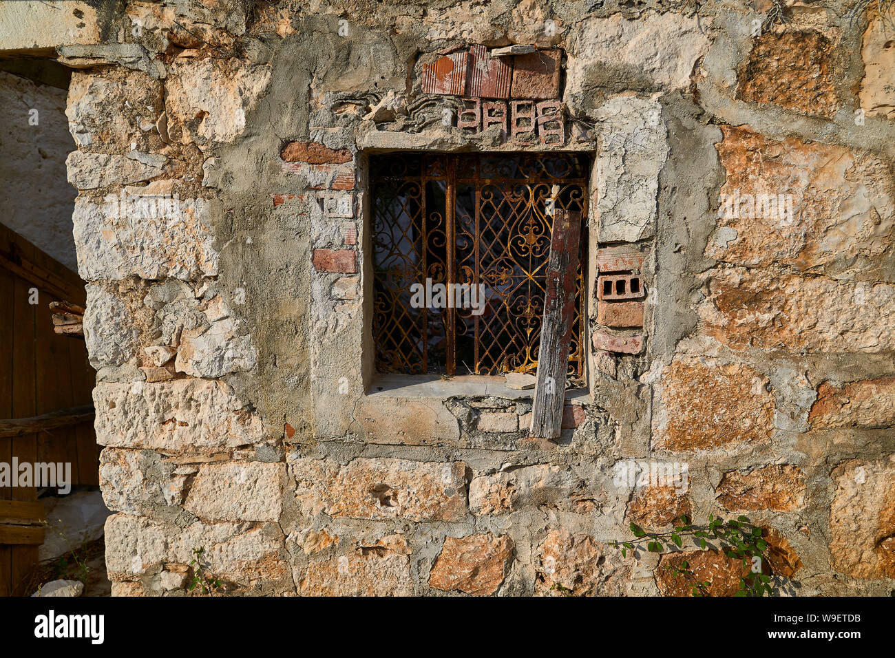 Wooden windows in a stone building Stock Photo - Alamy