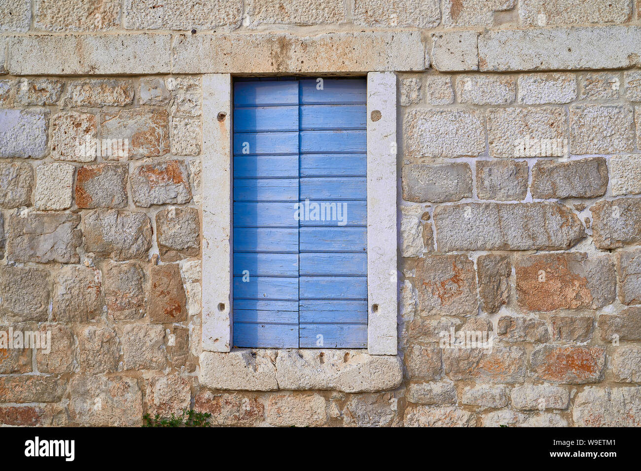 Wooden windows in a stone building Stock Photo - Alamy