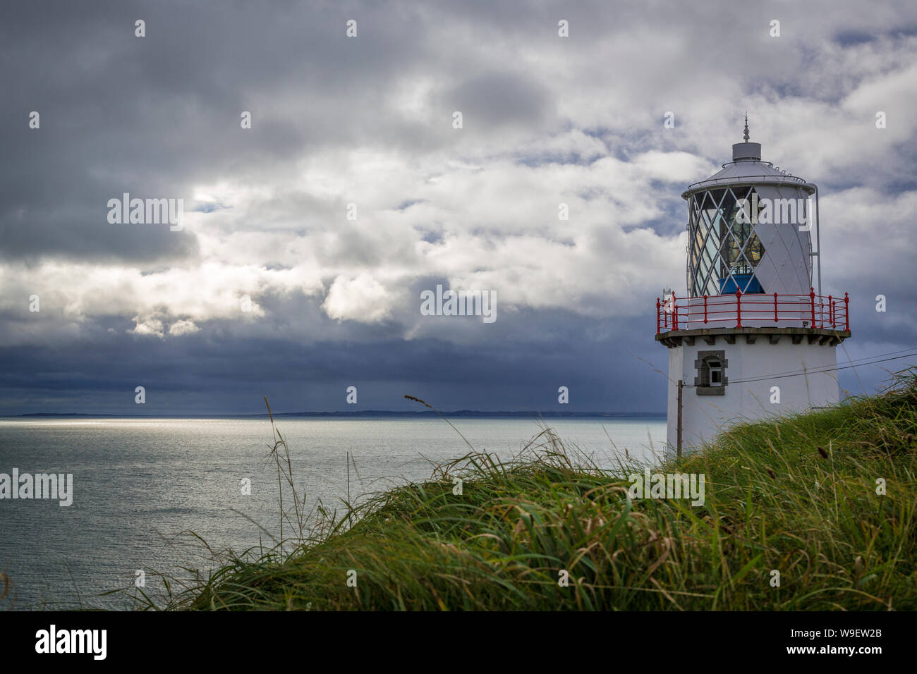 spectacular cliff walk at the Blackhead Lighthouse, Co Antrim, Northern ...