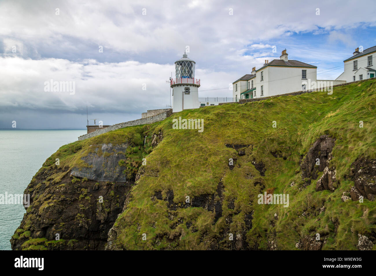 spectacular cliff walk at the Blackhead Lighthouse, Co Antrim, Northern ...