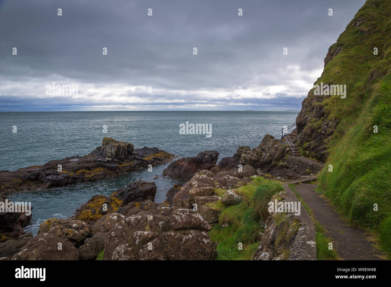 spectacular cliff walk at the Blackhead Lighthouse, Co Antrim, Northern ...