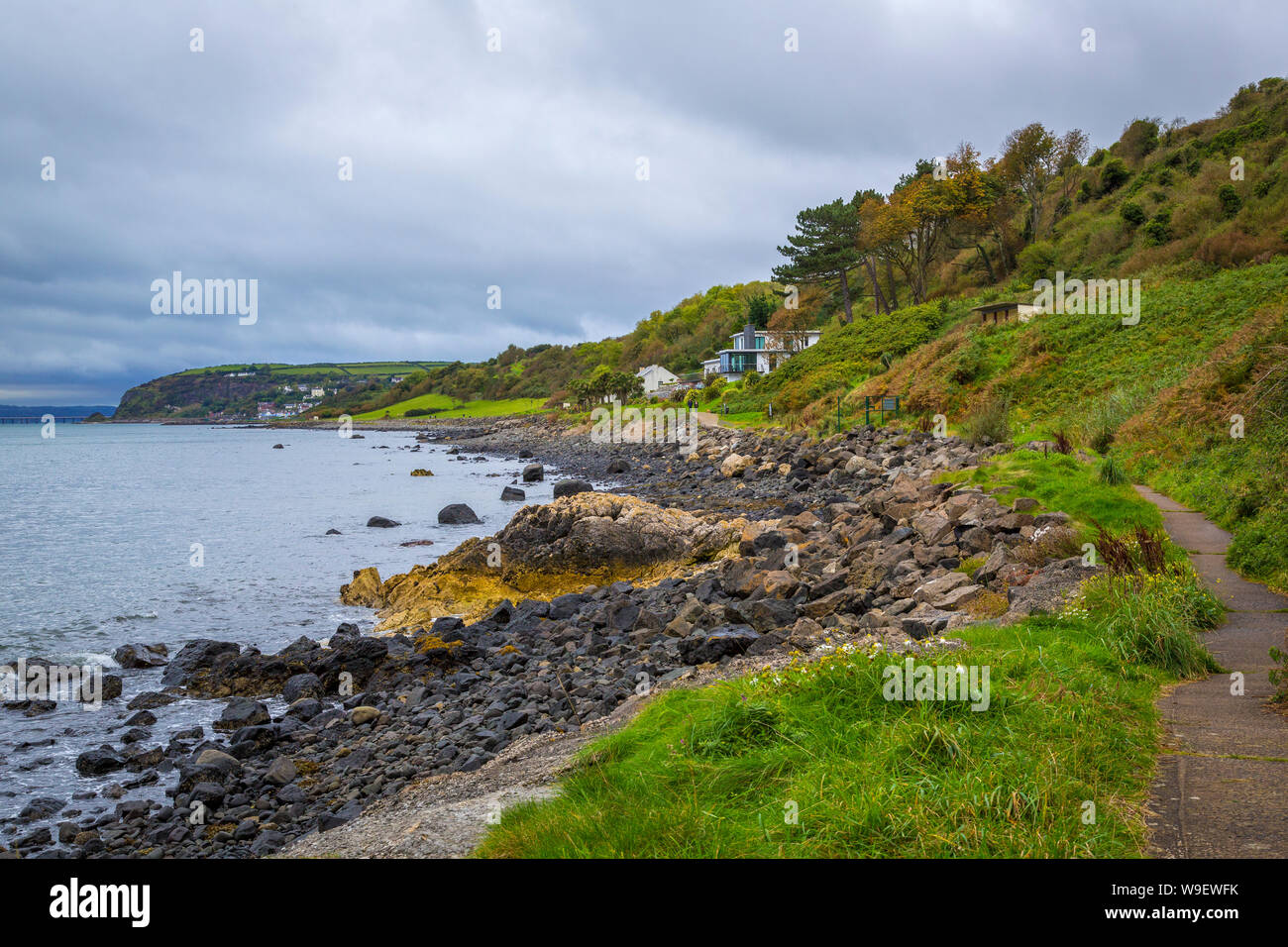 spectacular cliff walk at the Blackhead Lighthouse, Co Antrim, Northern ...
