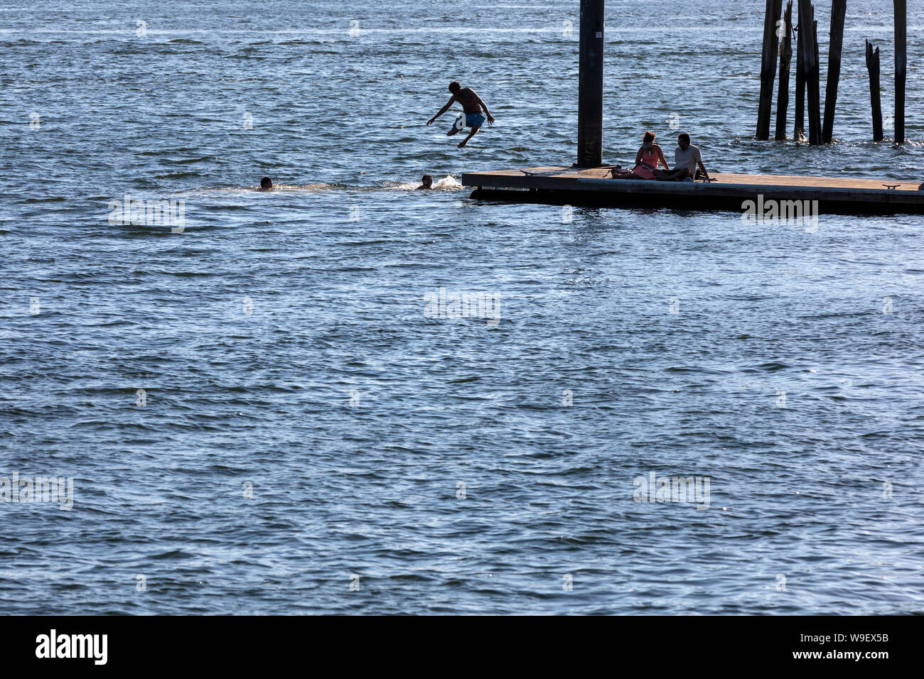 People swimming Boston Harbor, Boston Massachusetts USA Stock Photo - Alamy
