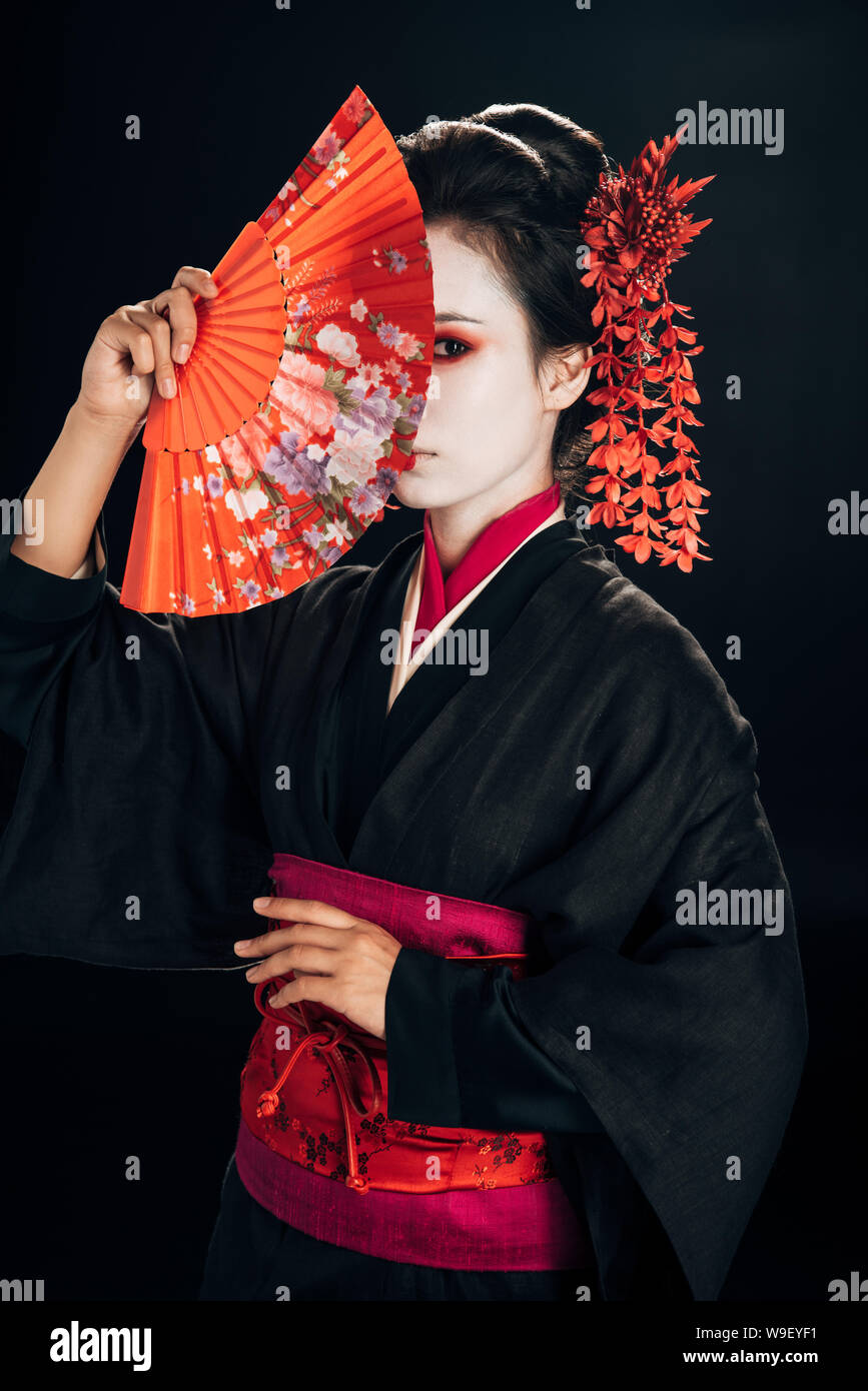 Hiding behind fan hi-res stock photography and images - Alamy