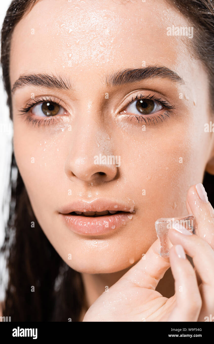Woman holding ice cube hi-res stock photography and images - Alamy