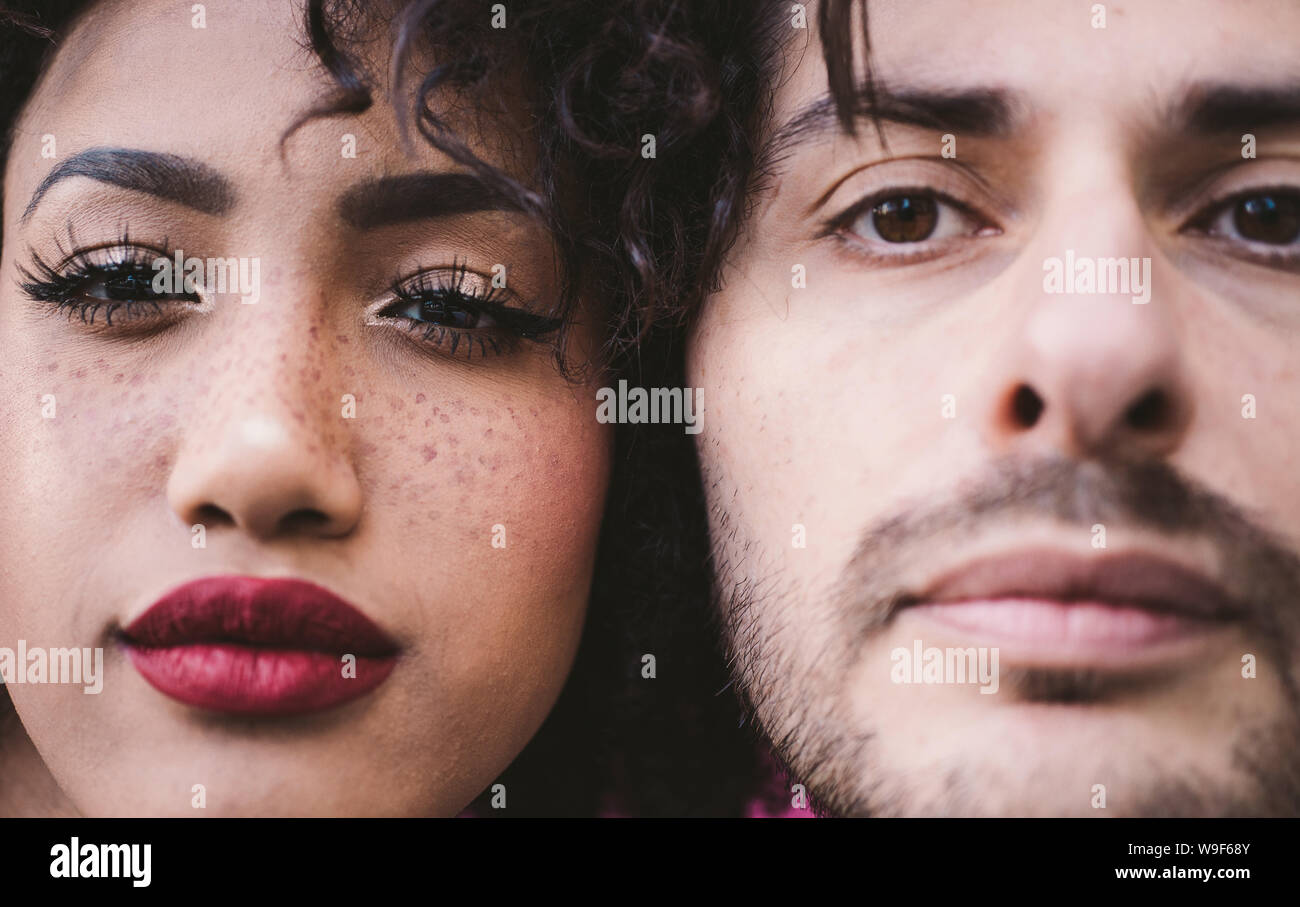 Multiethnic couple together, faces close up Stock Photo - Alamy