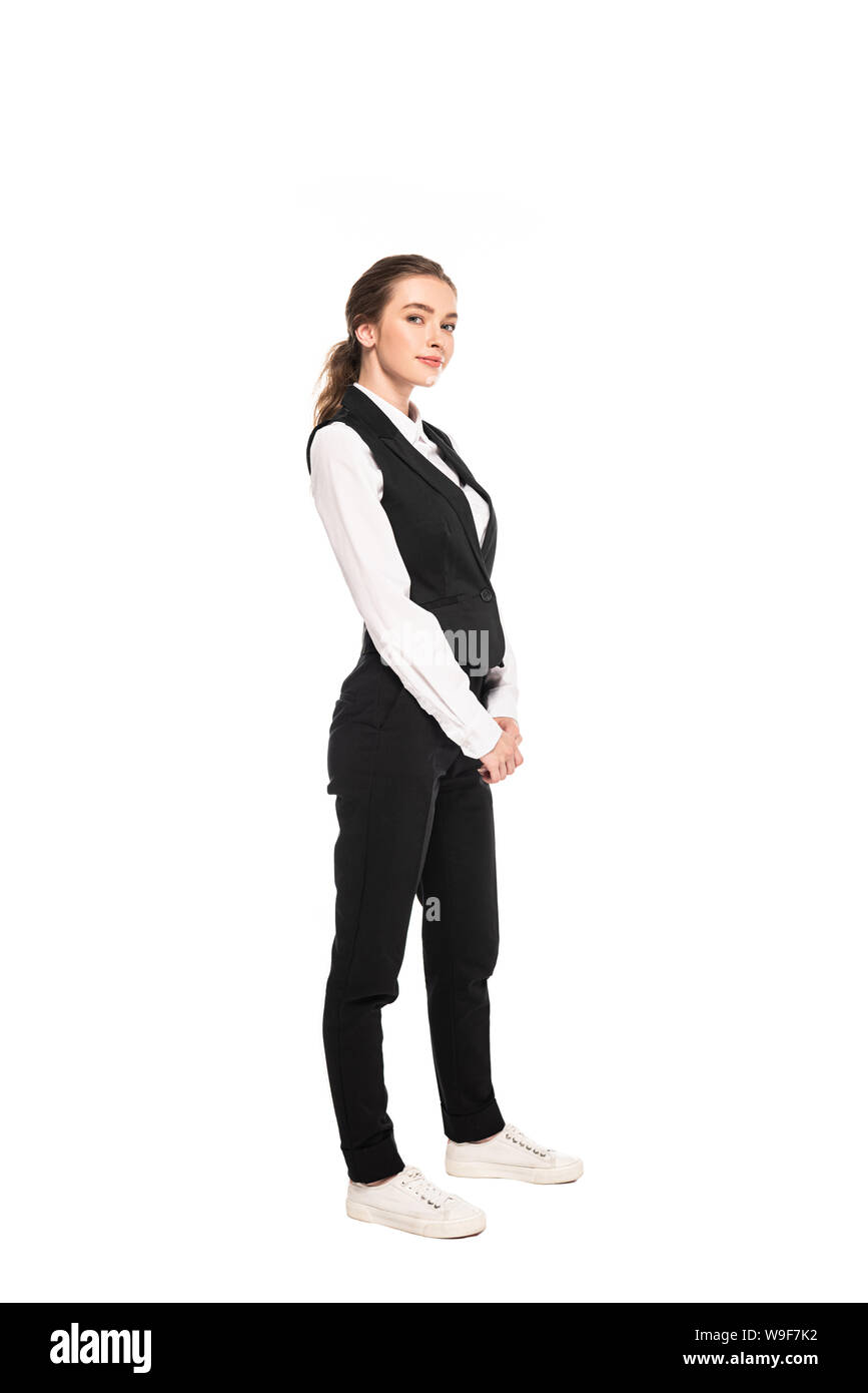 full length view of young waitress in formal wear isolated on white ...