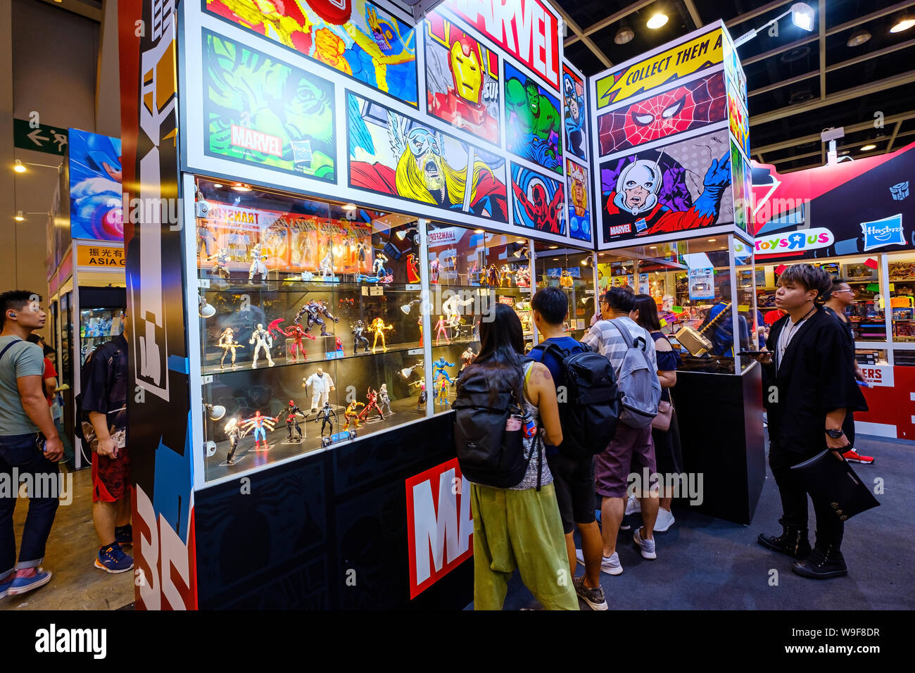 Visitors and customers seen at Disney's Marvel Studio booth during the ...