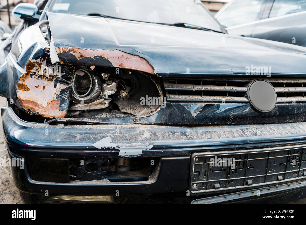 selective focus of damaged headlight in automobile after car accident ...