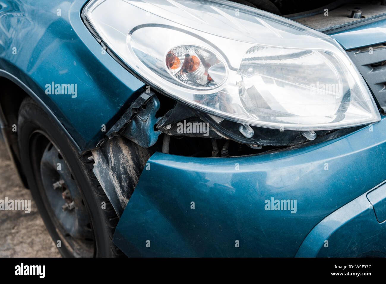 selective focus of crashed blue vehicle after car accident Stock Photo ...